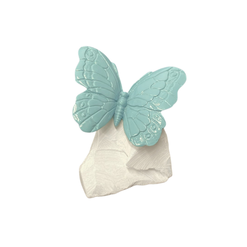Mariposa Turquesa sobre Piedra de Huamanga - Resina | Argentaria